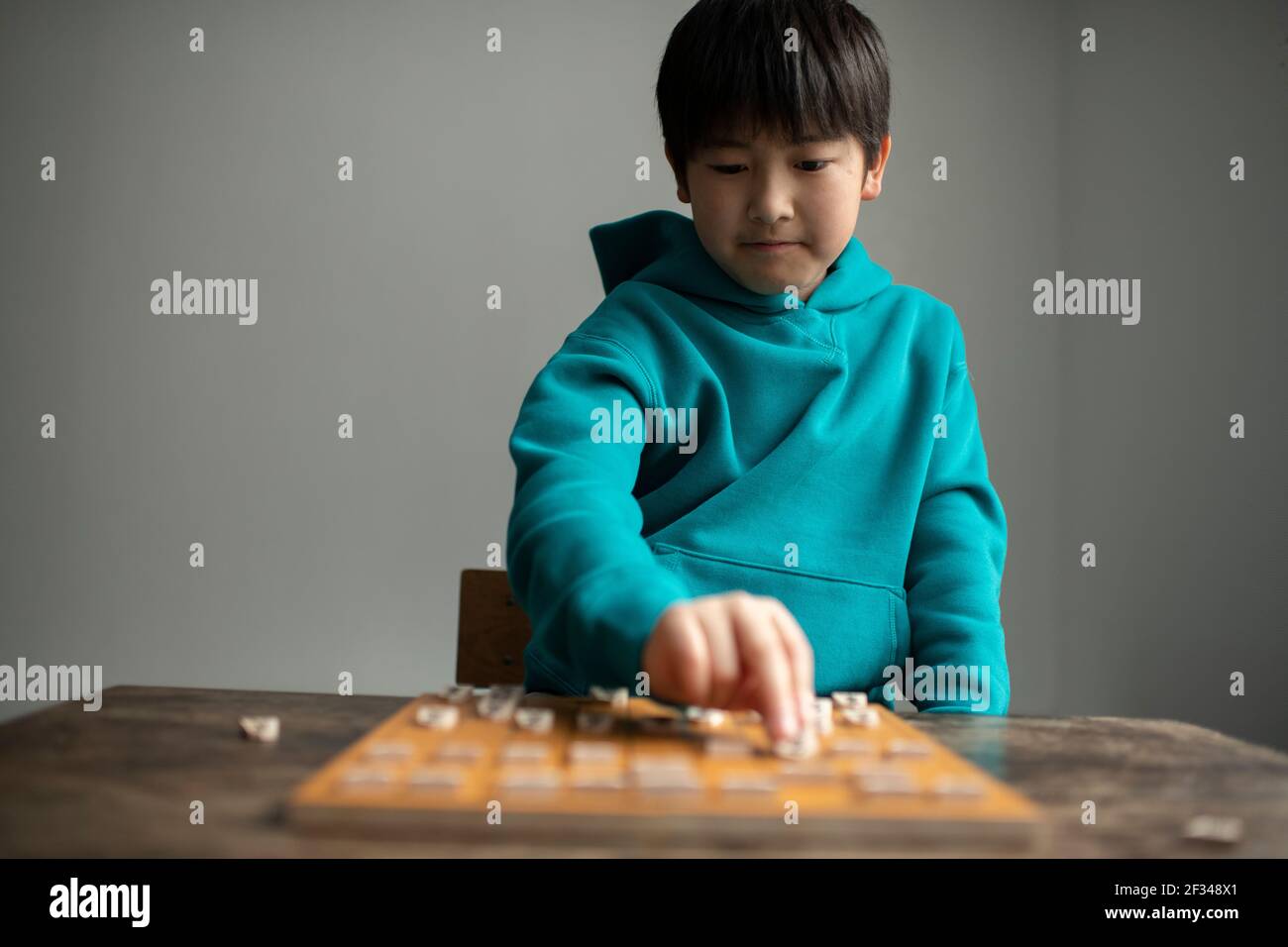 Elementary School Student as a Shogi (Japanese Chess) Player Stock ...