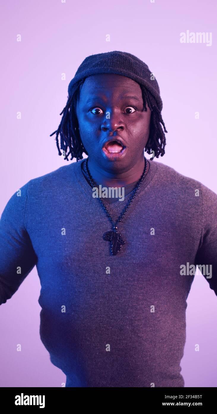Young african man in shock . High quality photo Stock Photo - Alamy