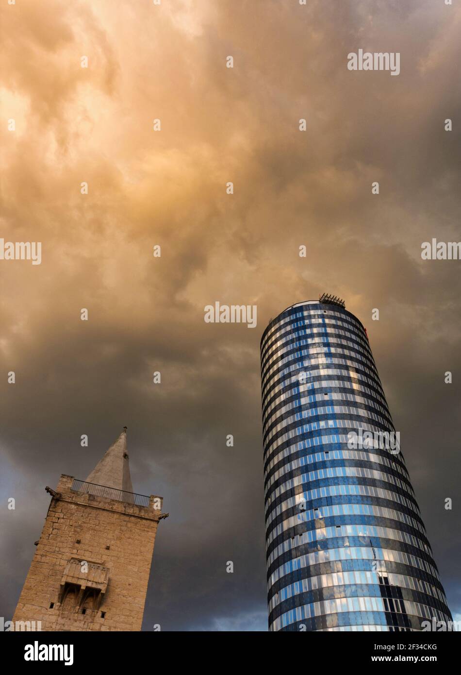 A vertical low angle shot of a modern architectural structure under the ...