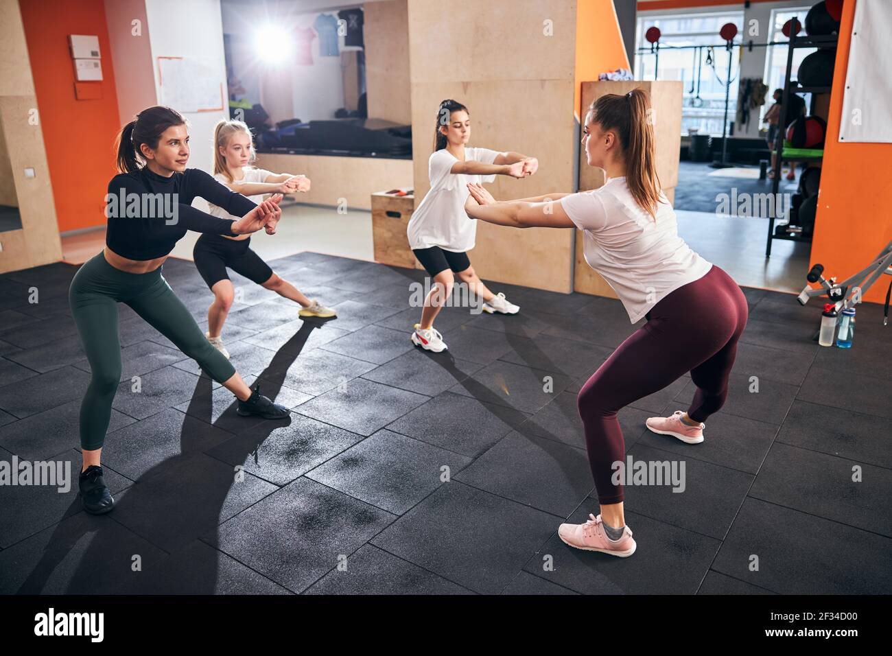 Easier workouts are ones done in group of best friends Stock Photo - Alamy