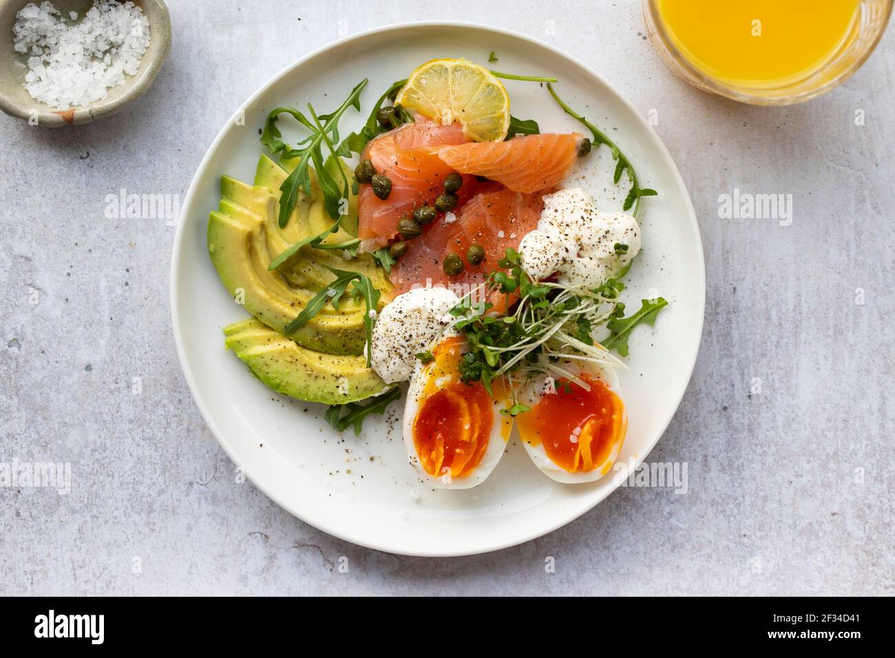 Healthy breakfast with egg, smoked salmon and avocado Stock Photo - Alamy