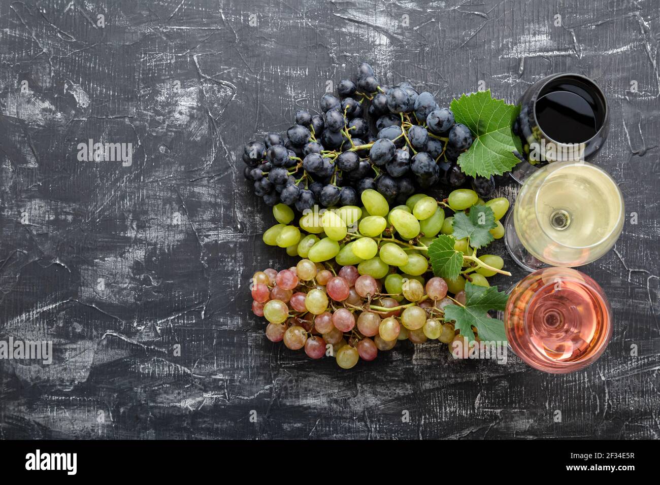 Assortment different types of wine and grape grade varieties. White ...