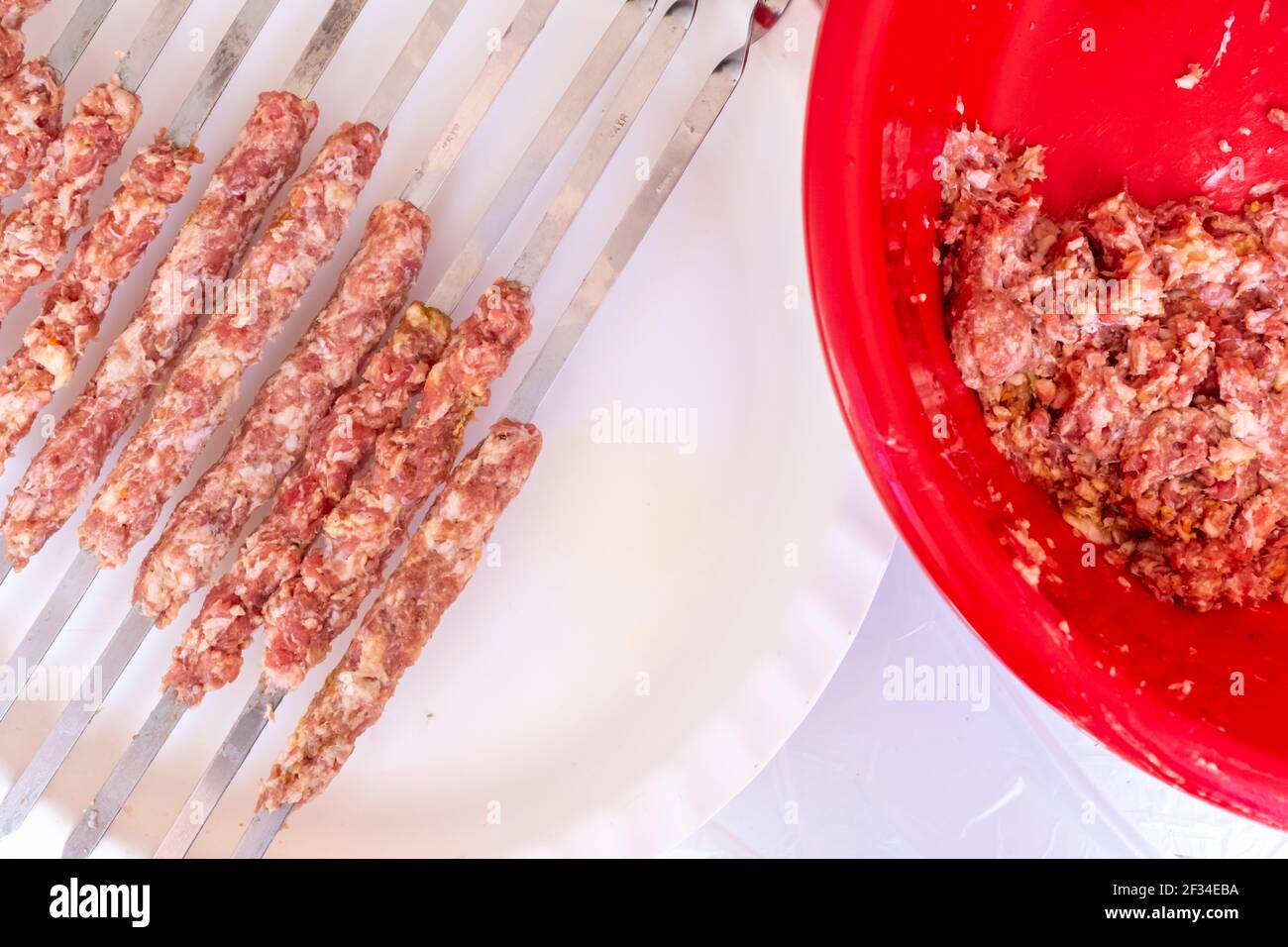 Arabic Muslim family preparing for barbeque Stock Photo - Alamy