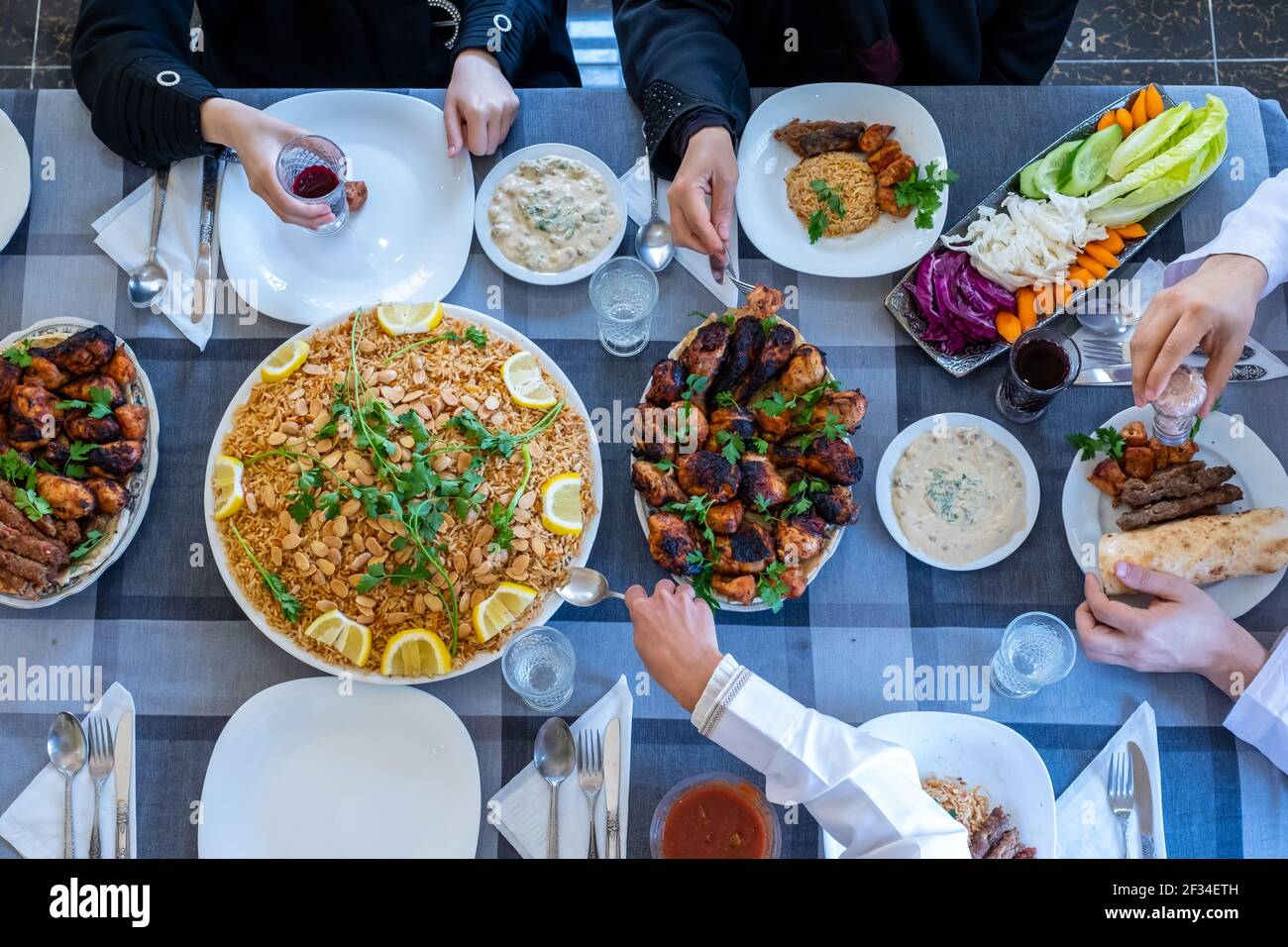 Happy arabic muslim family enjoying the food togther in ramadan Stock ...