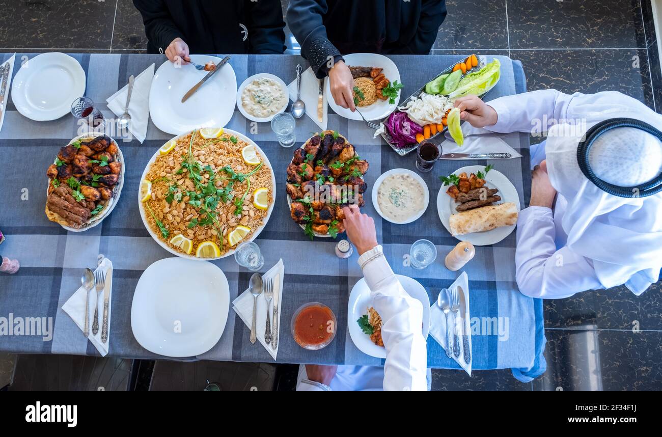 Muslim woman eating salad hi-res stock photography and images - Alamy