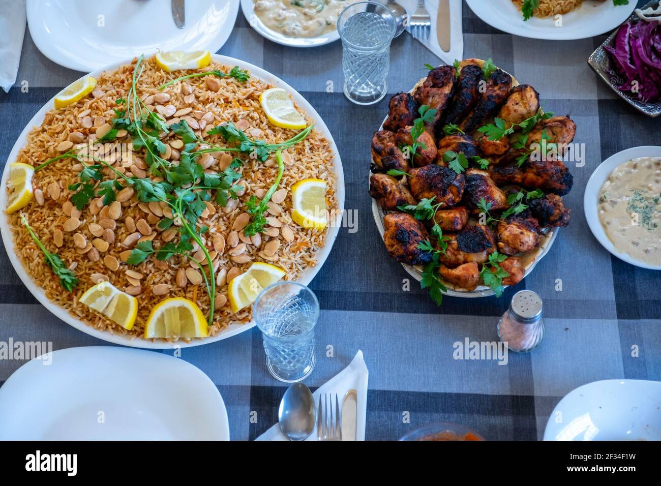 Happy Arabic Muslim family enjoying the food together in Ramadan Stock ...