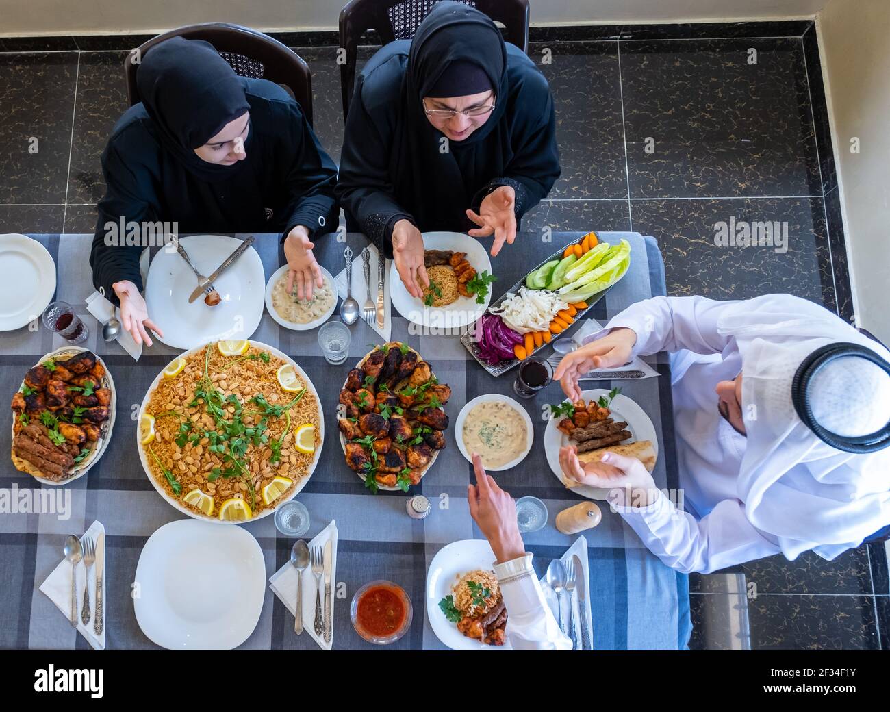 Happy arabic muslim family enjoying the food togther in ramadan Stock ...