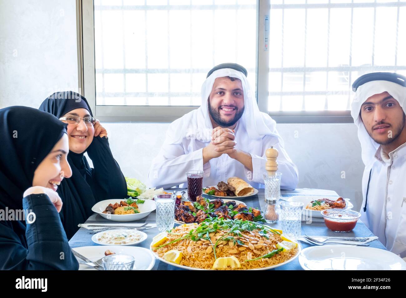 Happy arabic muslim family enjoying the food togther in ramadan Stock ...