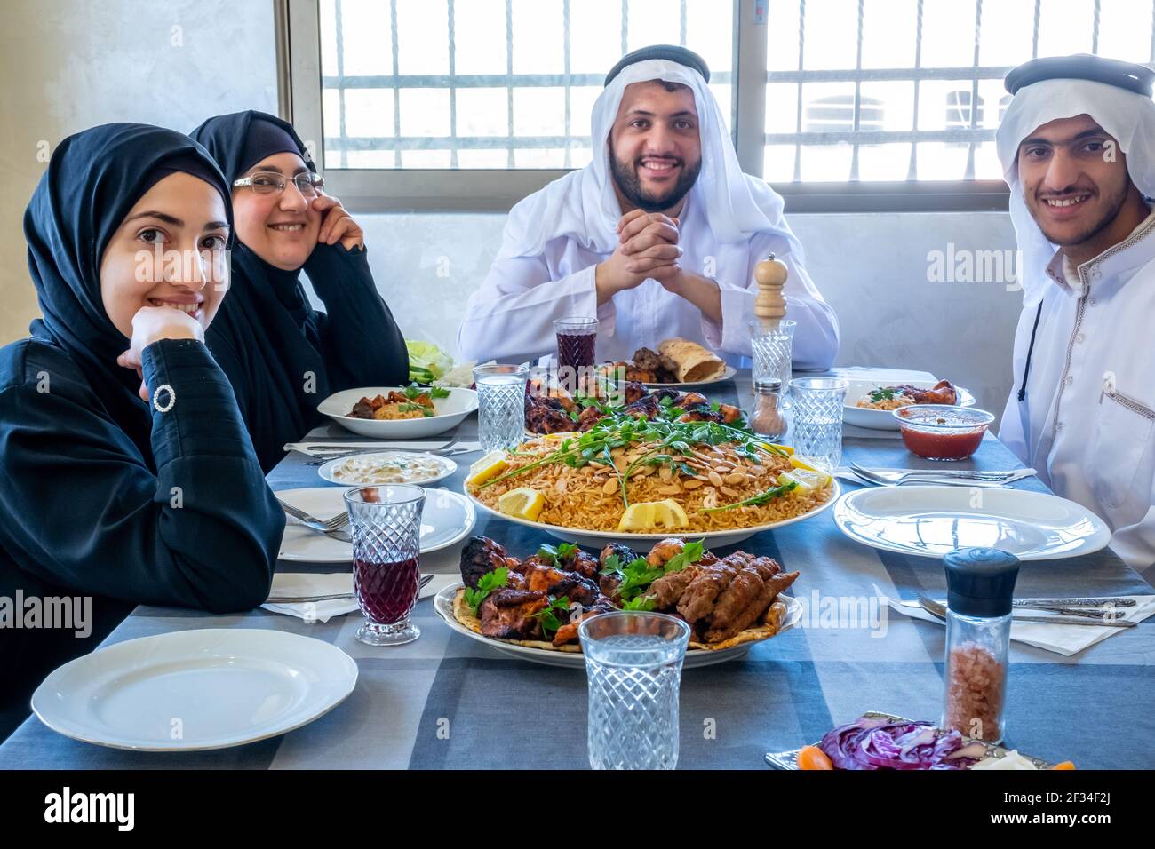 Happy arabic muslim family enjoying the food togther in ramadan Stock ...