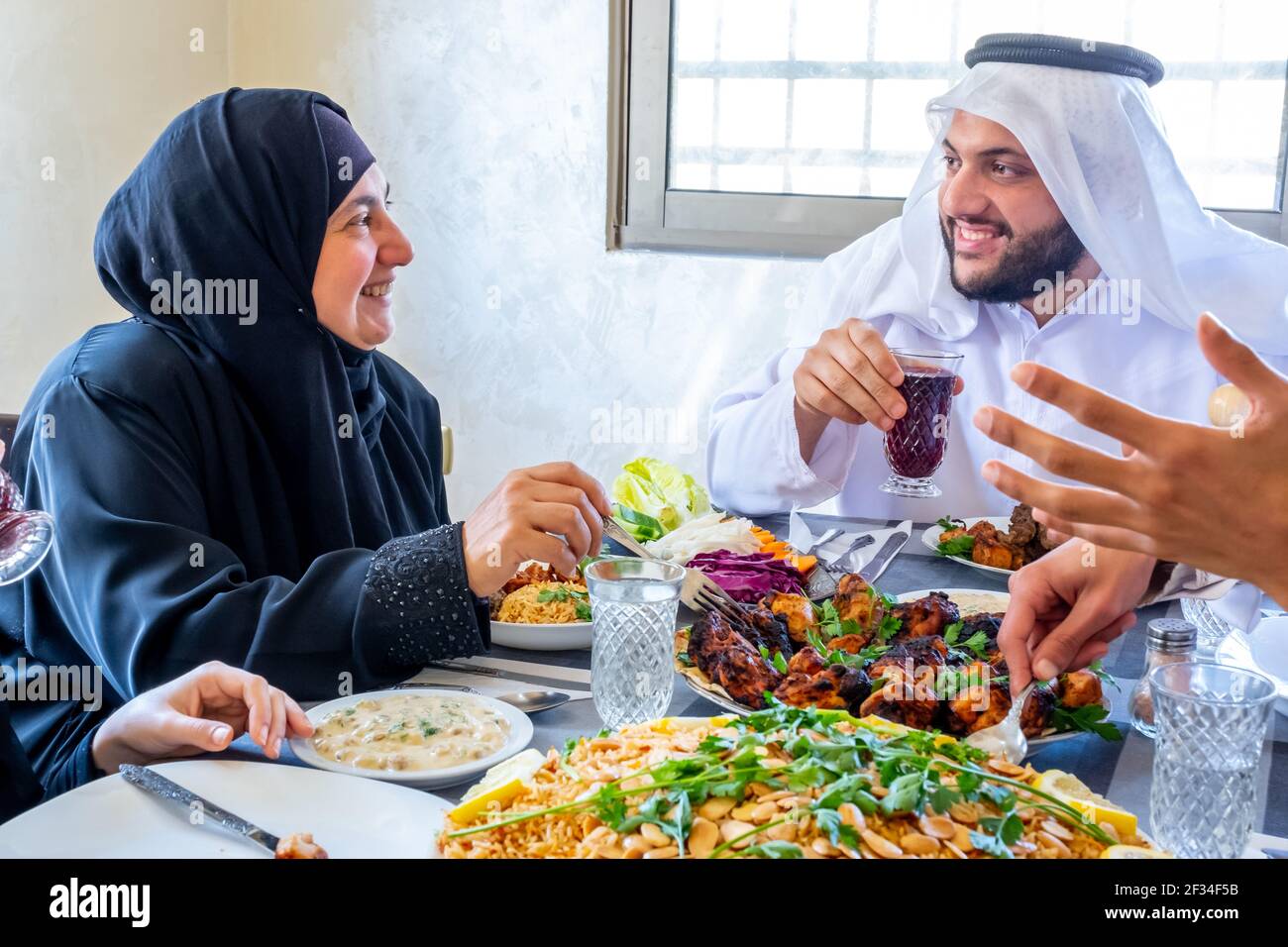Happy arabic muslim family enjoying the food togther in ramadan Stock ...