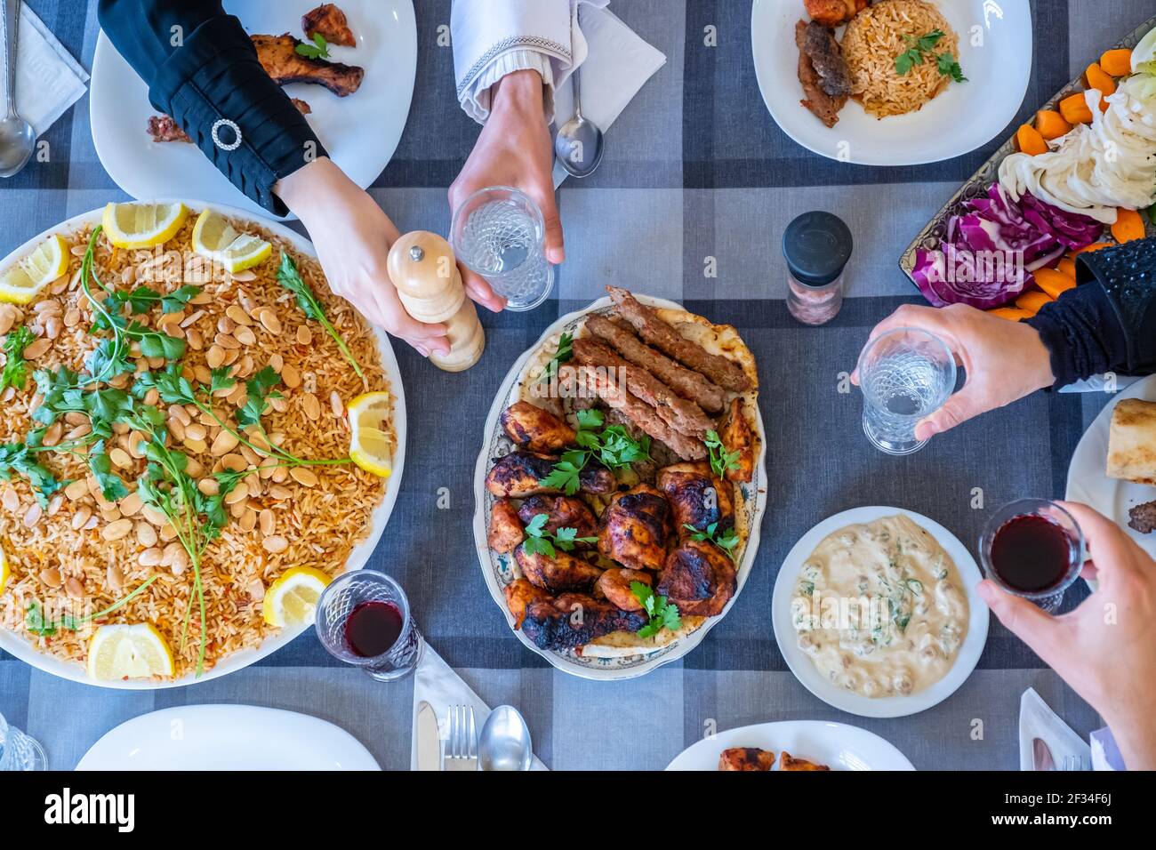 happy Muslim family eating together Stock Photo - Alamy