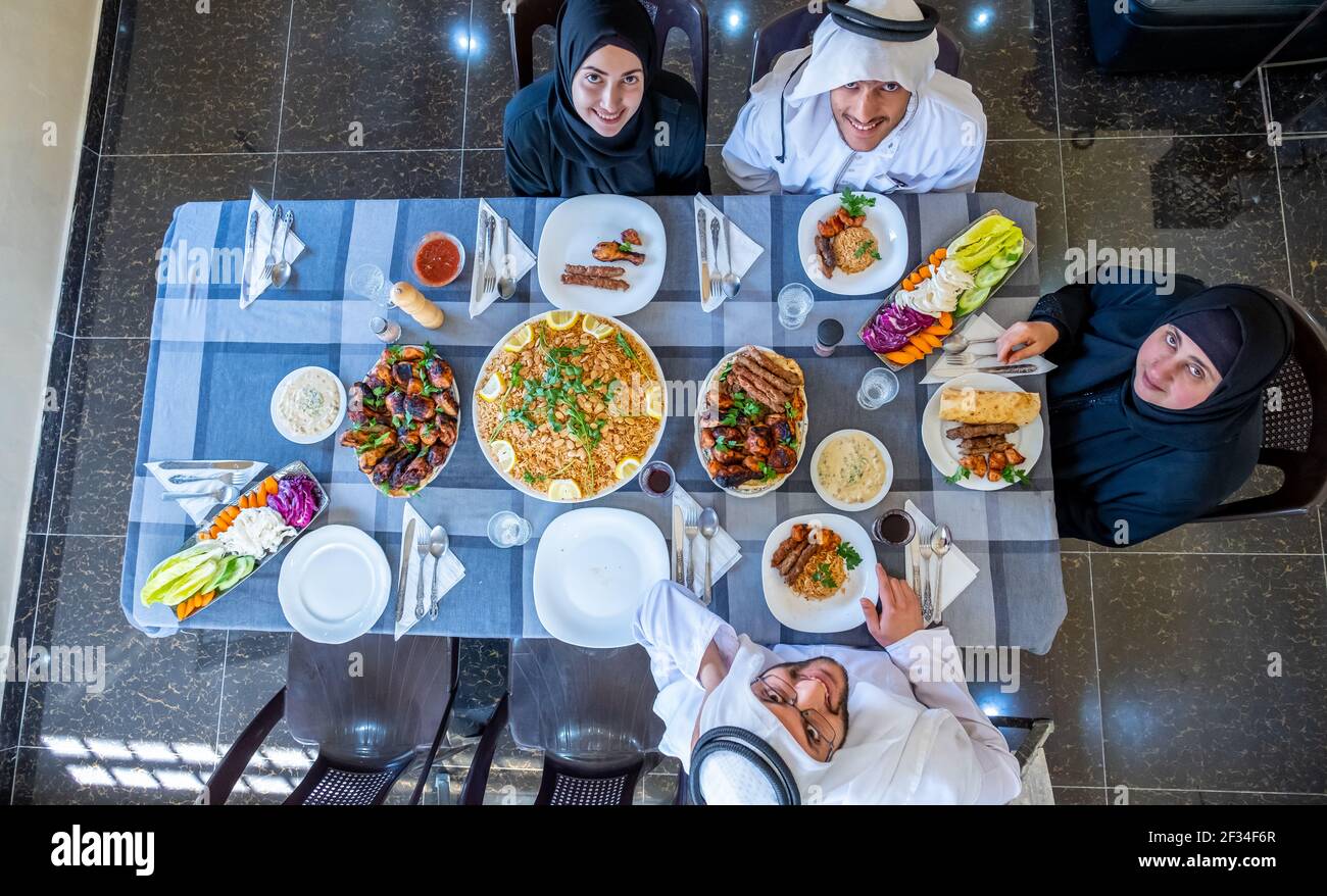 Happy arabic muslim family enjoying the food togther in ramadan Stock ...
