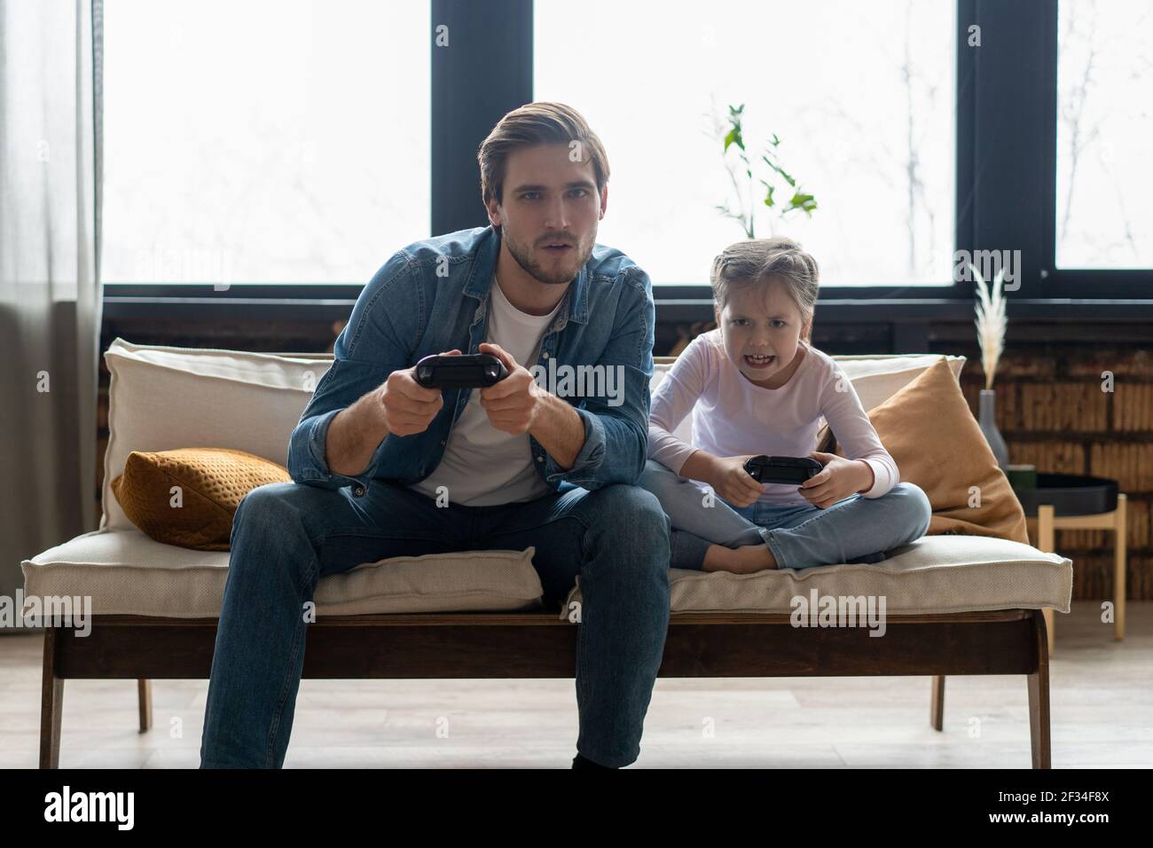 family, gaming and entertainment concept - happy father and little ...