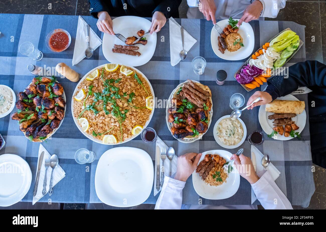Happy arabic muslim family enjoying the food togther in ramadan Stock ...
