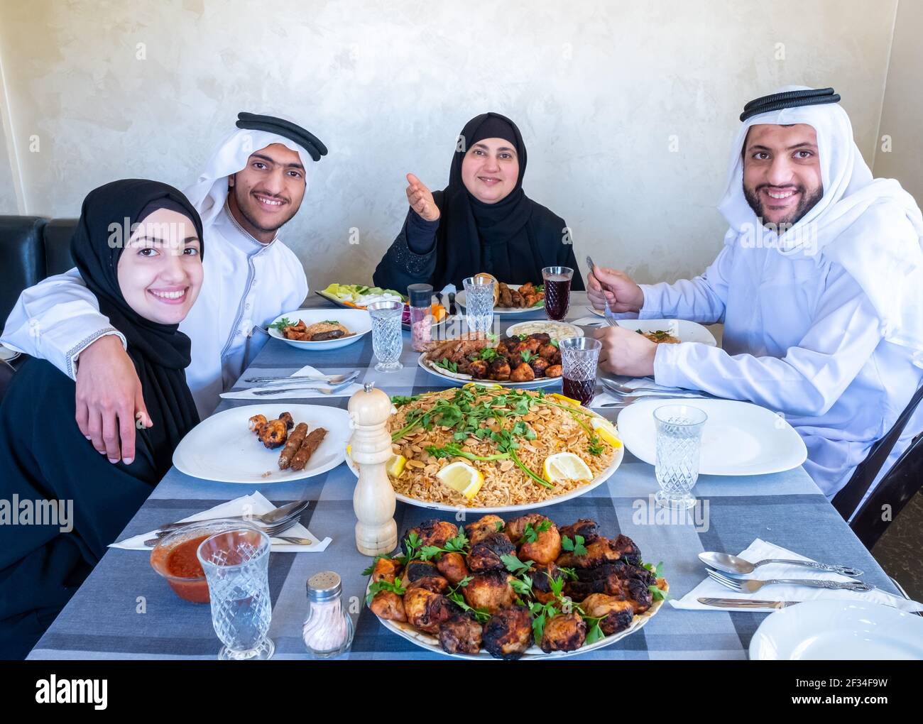 Happy arabic muslim family enjoying the food togther in ramadan Stock ...