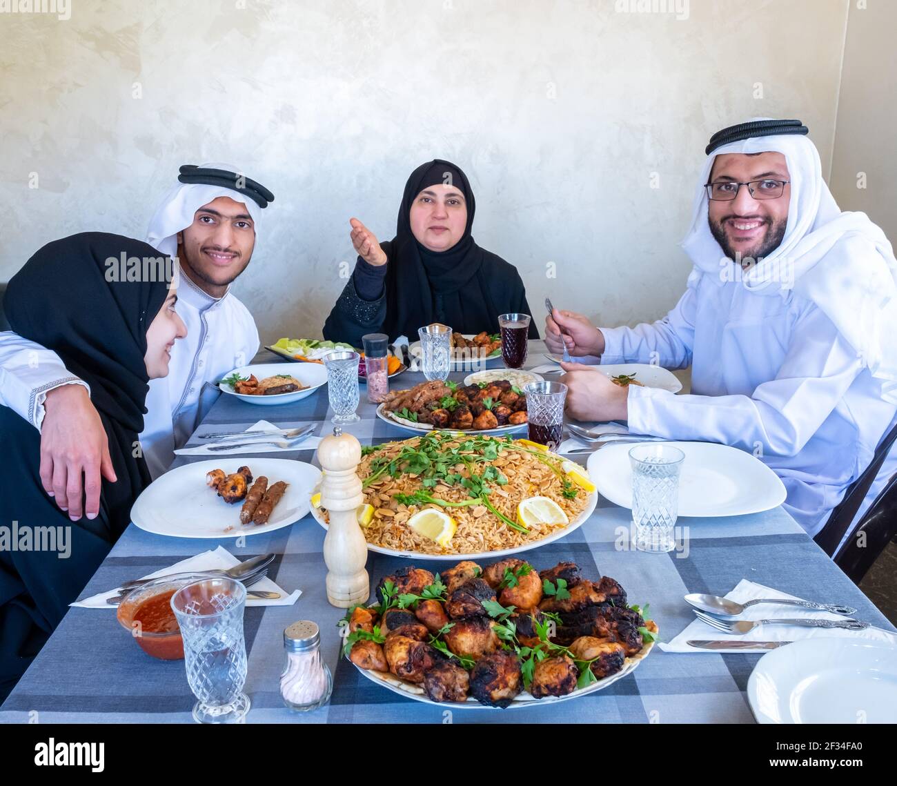 Happy arabic muslim family enjoying the food togther in ramadan Stock ...