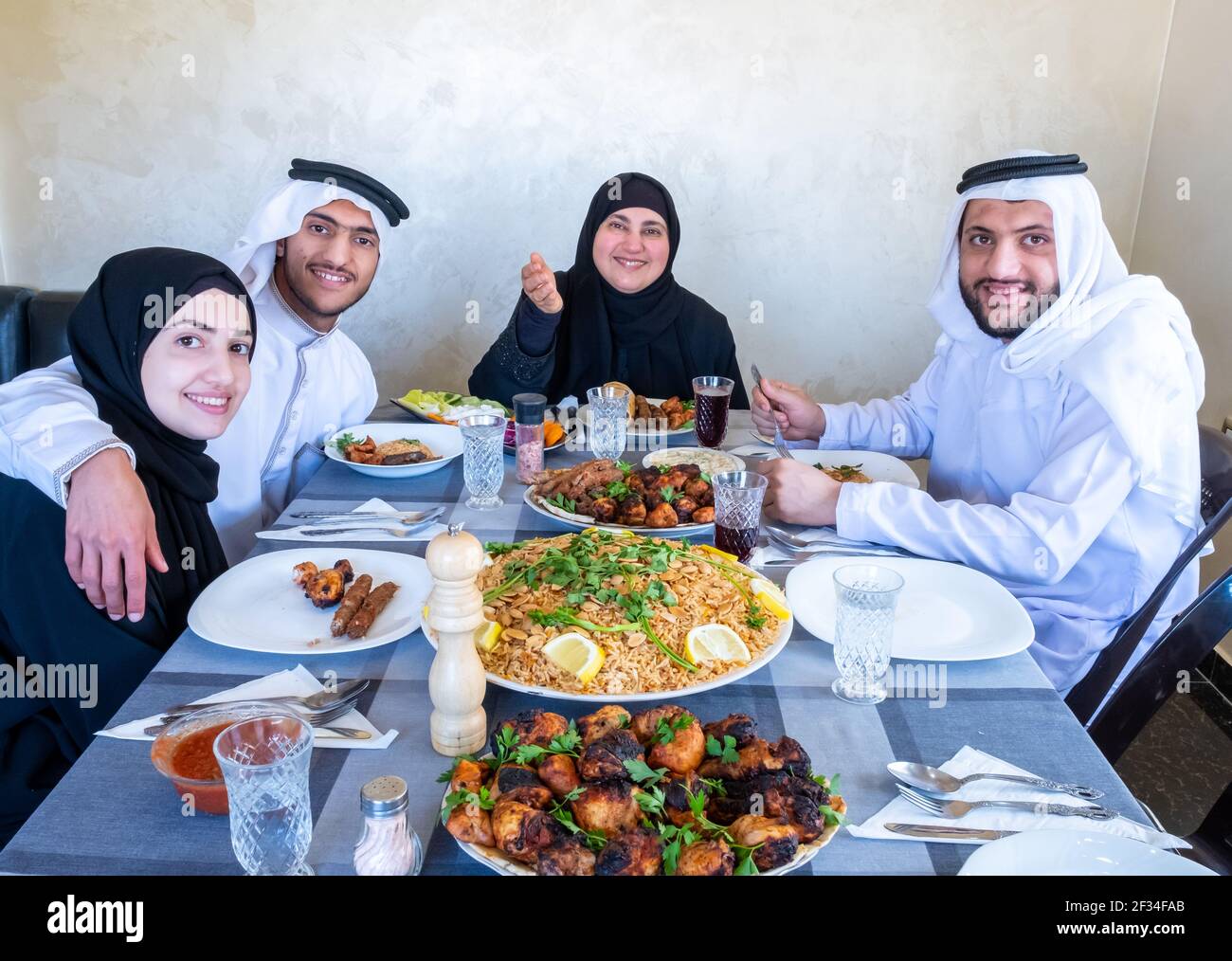 Happy arabic muslim family enjoying the food togther in ramadan Stock ...