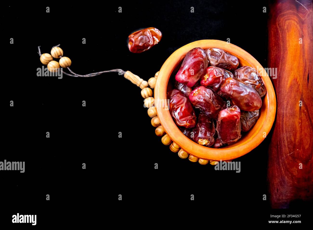 Small pot filled with dates Stock Photo - Alamy