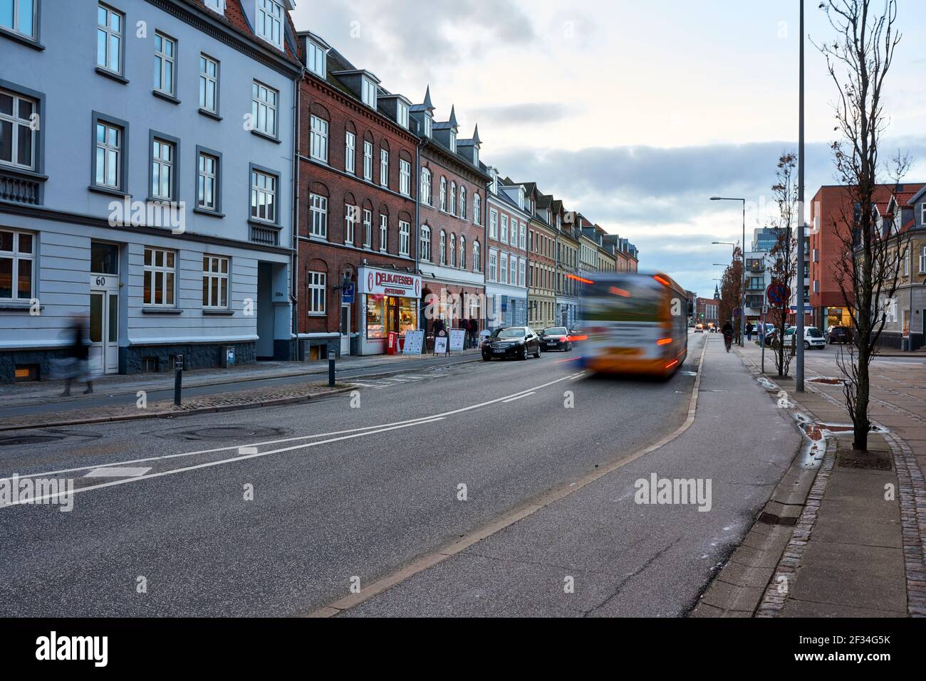 moving bus on street road in city Stock Photo - Alamy