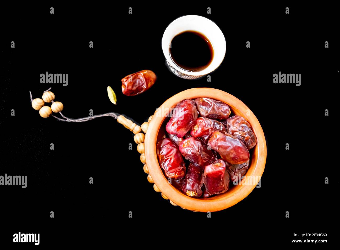 Small pot filled with dates Stock Photo - Alamy