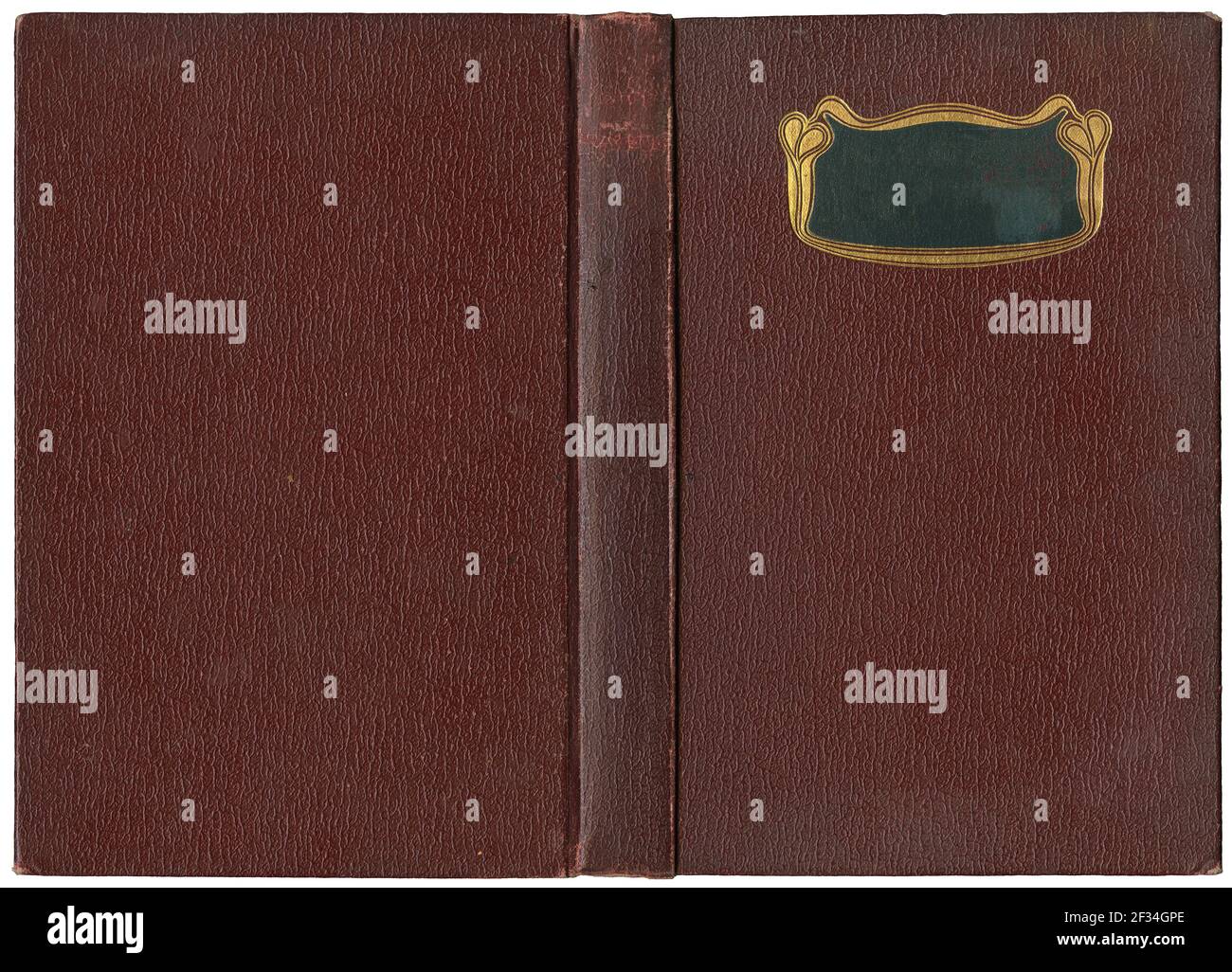 Old open book cover in brown canvas with ornamental golden frame ...