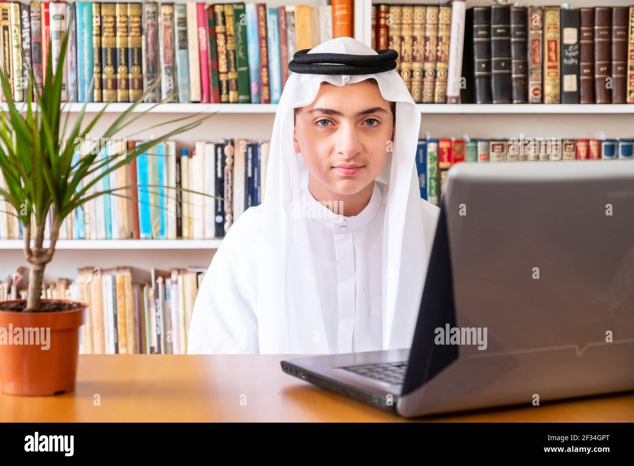 Arabic muslim man studying at home Stock Photo - Alamy