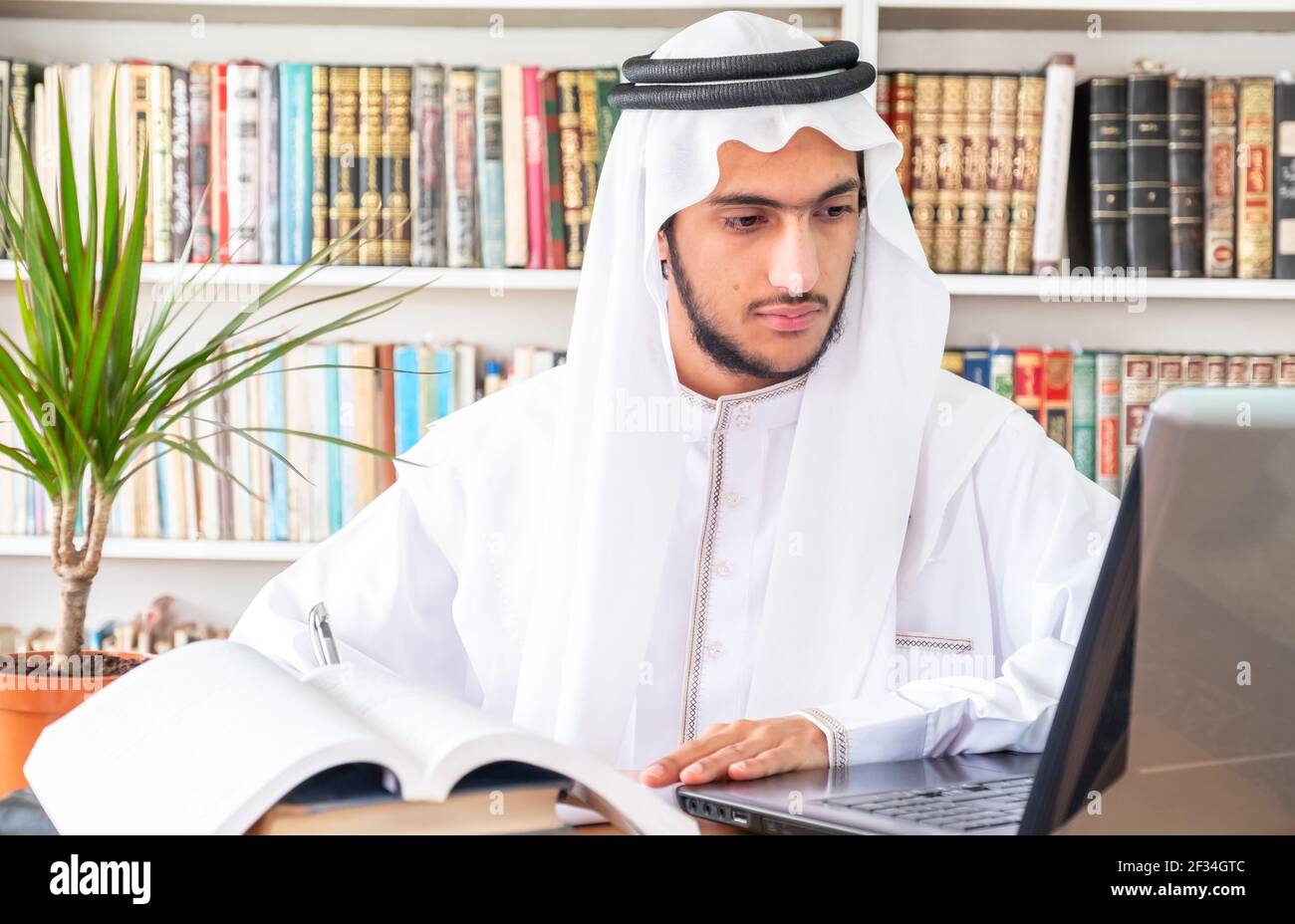 Arabic Muslim student studying online Stock Photo - Alamy