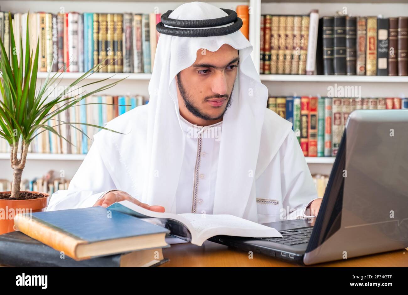 Arabic Muslim student studying online Stock Photo - Alamy