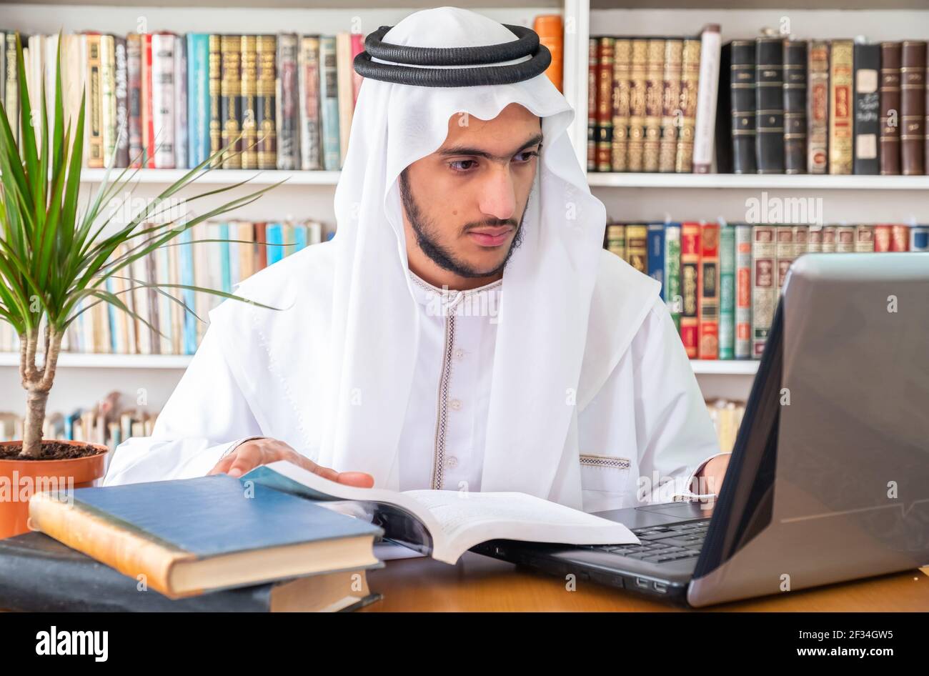 Arabic Muslim student studying online Stock Photo - Alamy