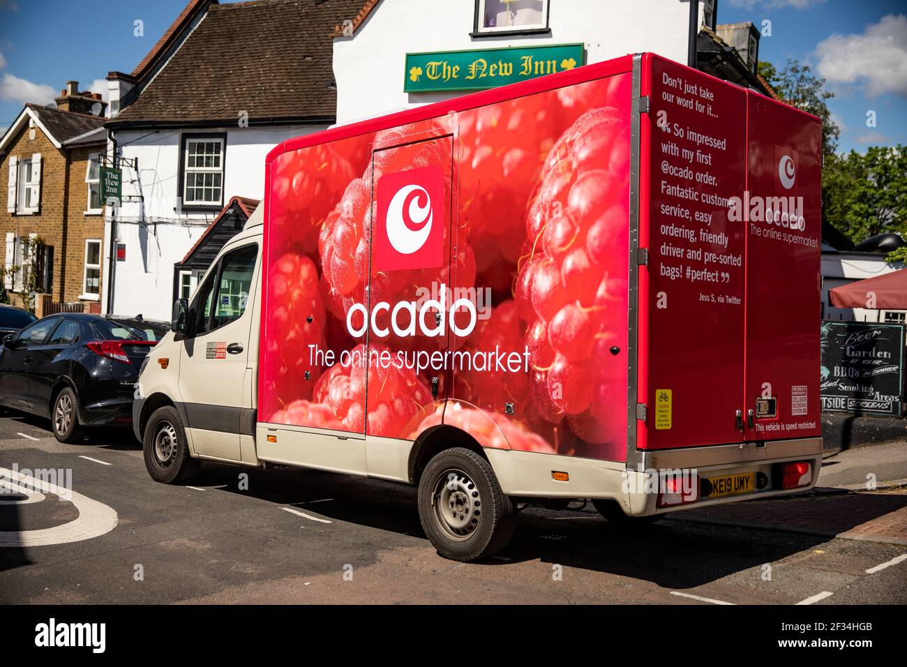 A Ocado delivery driver after dropping off food shopping outside a ...