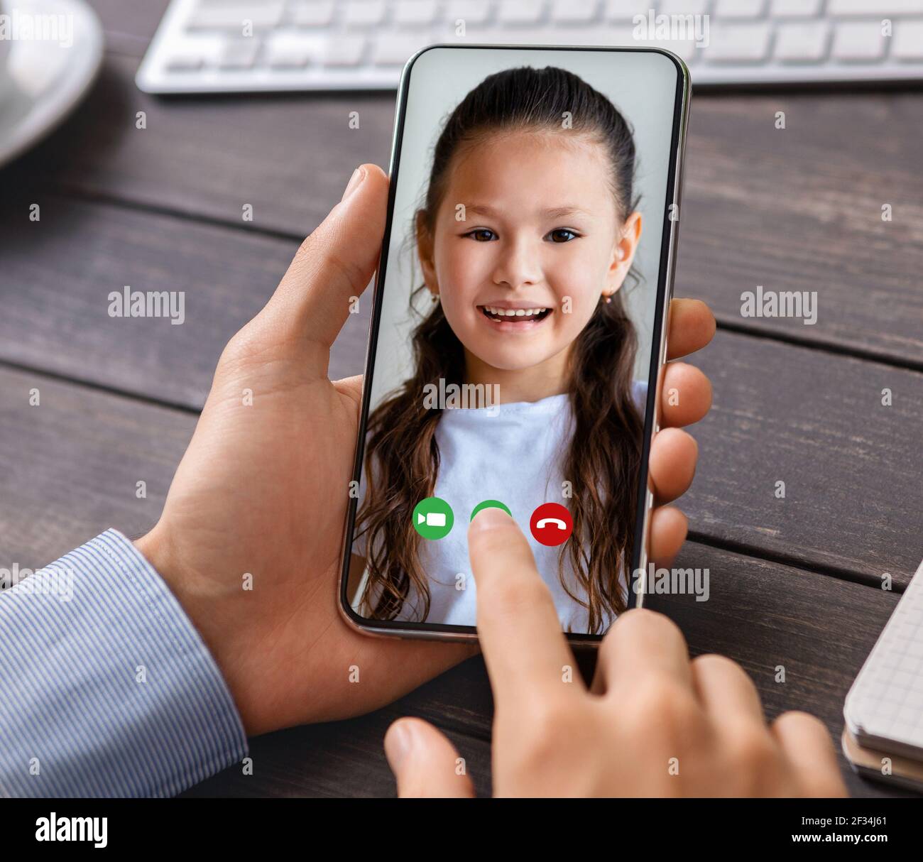 Video call from daughter at work, communication with family and online ...