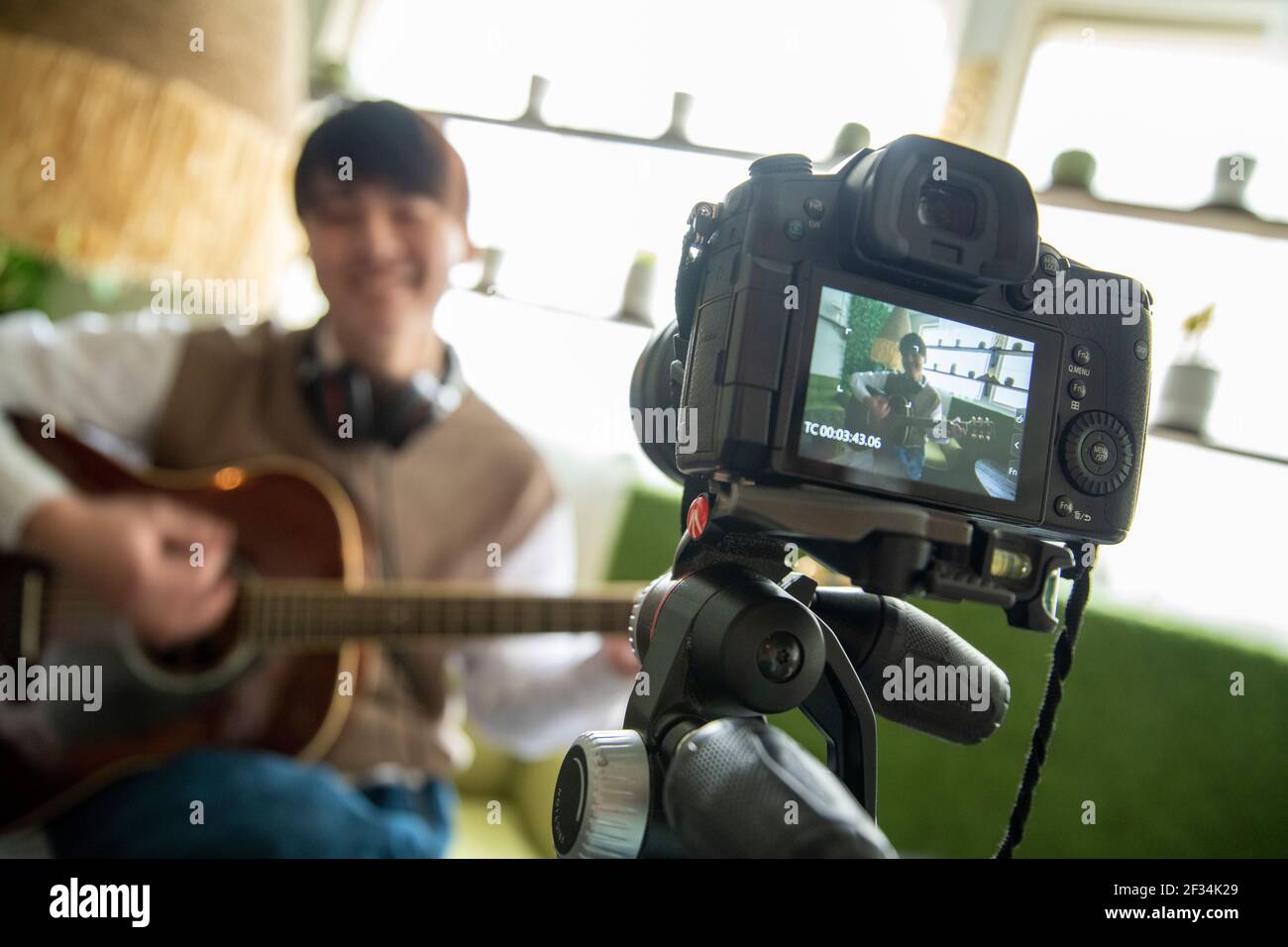 Man Live Streaming Stock Photo - Alamy