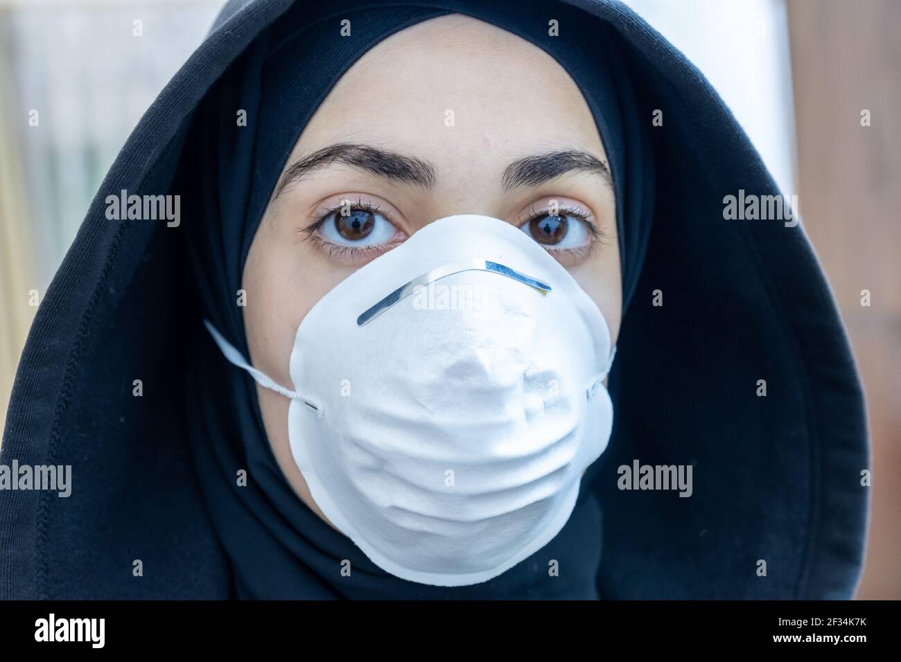 Arabic muslim females wearing masks Stock Photo - Alamy