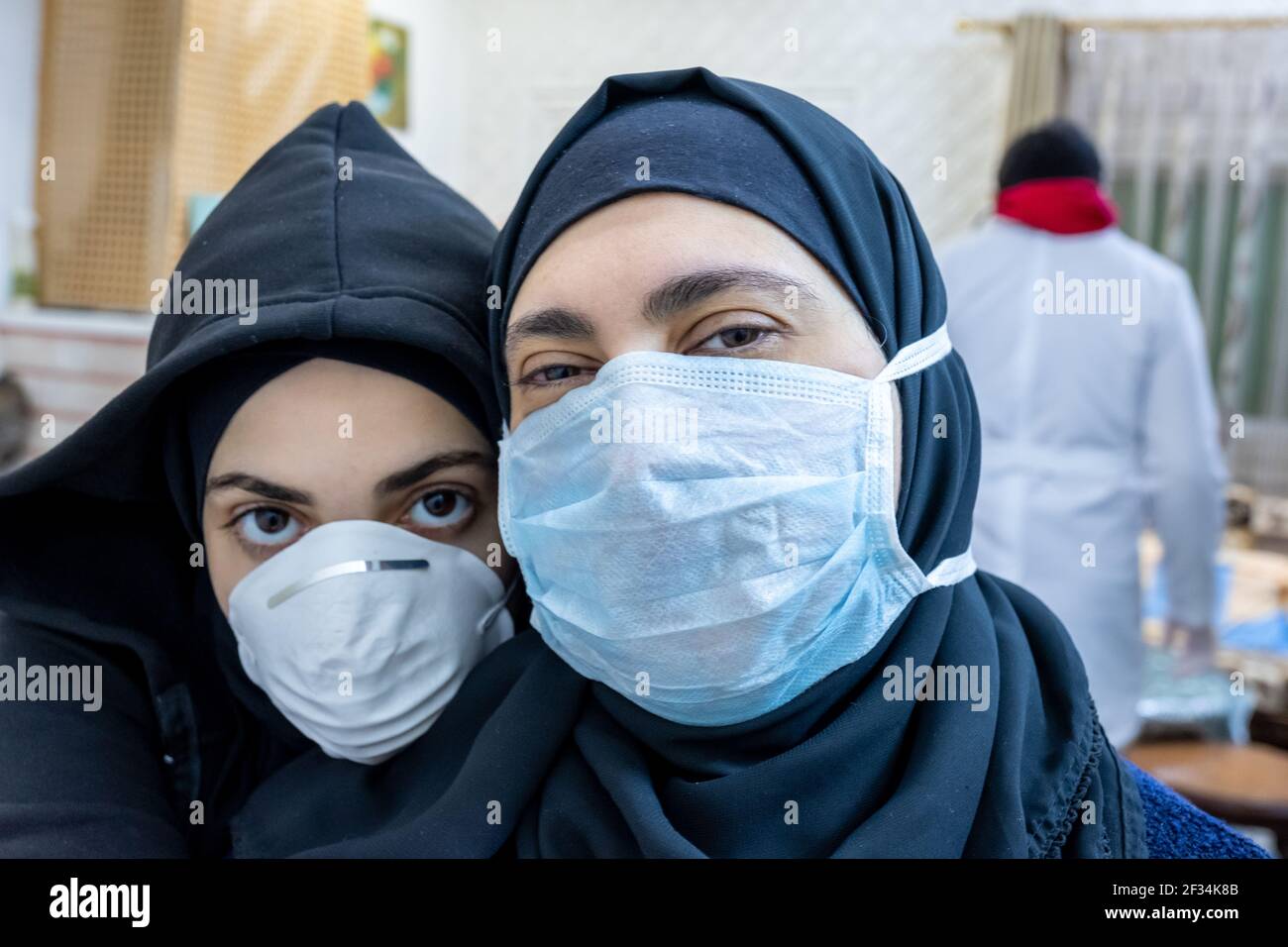 Arabic muslim females wearing masks Stock Photo - Alamy