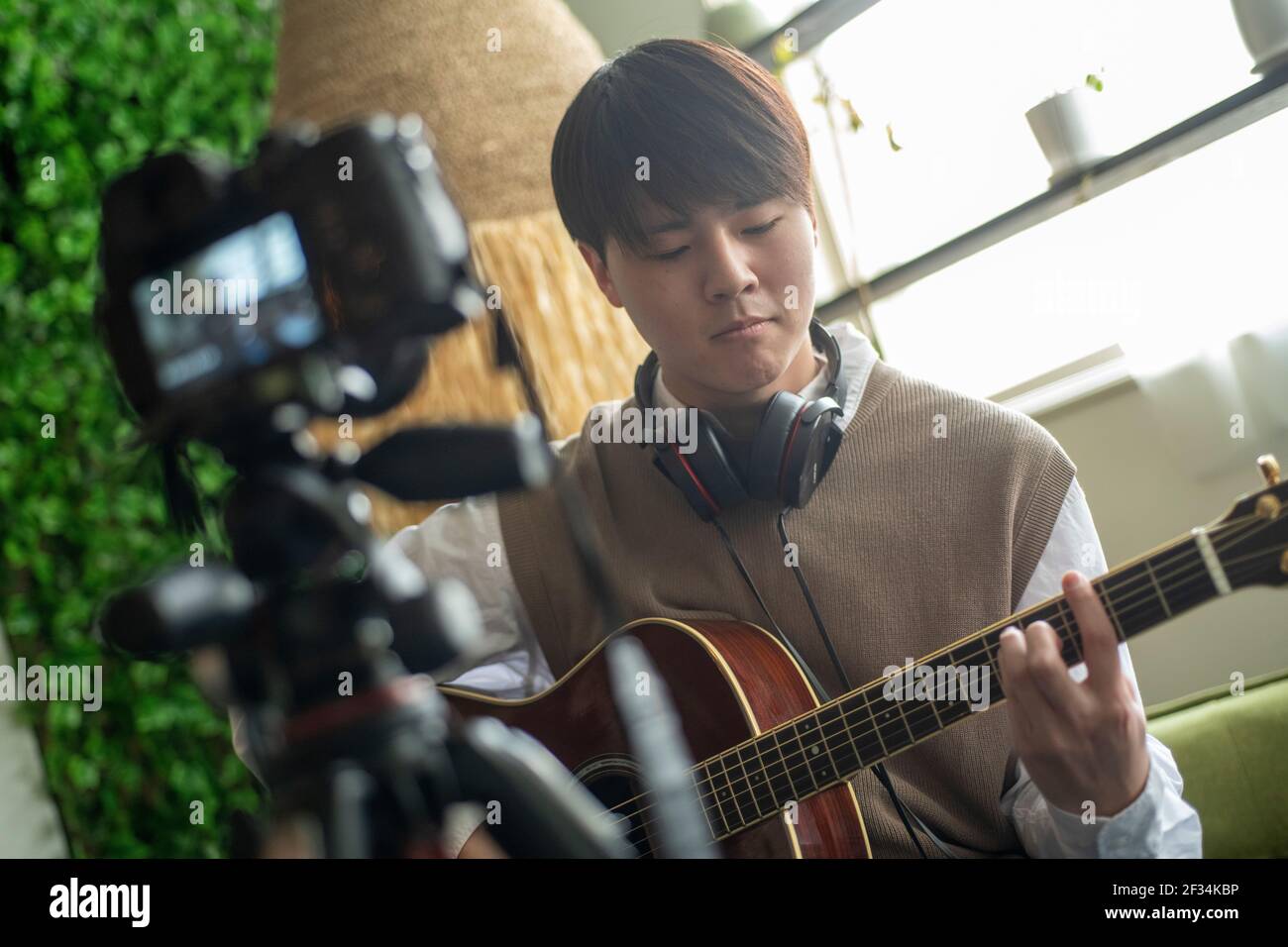 Man Live Streaming Stock Photo - Alamy