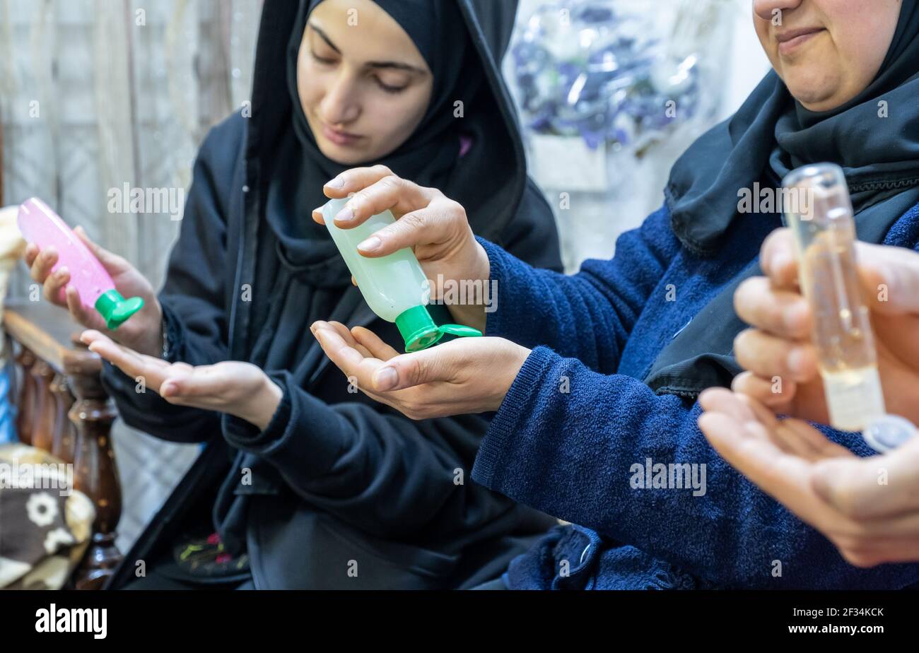 Arabic Muslim family using hygiene products Stock Photo - Alamy