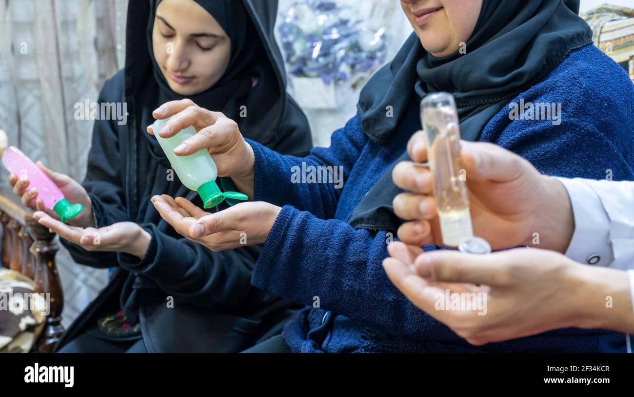Arabic Muslim family using hygiene products Stock Photo - Alamy