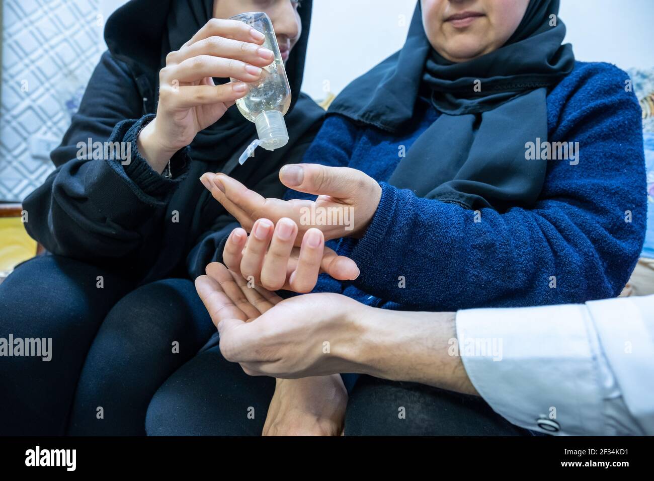 Arabic Muslim family using hygiene products Stock Photo - Alamy
