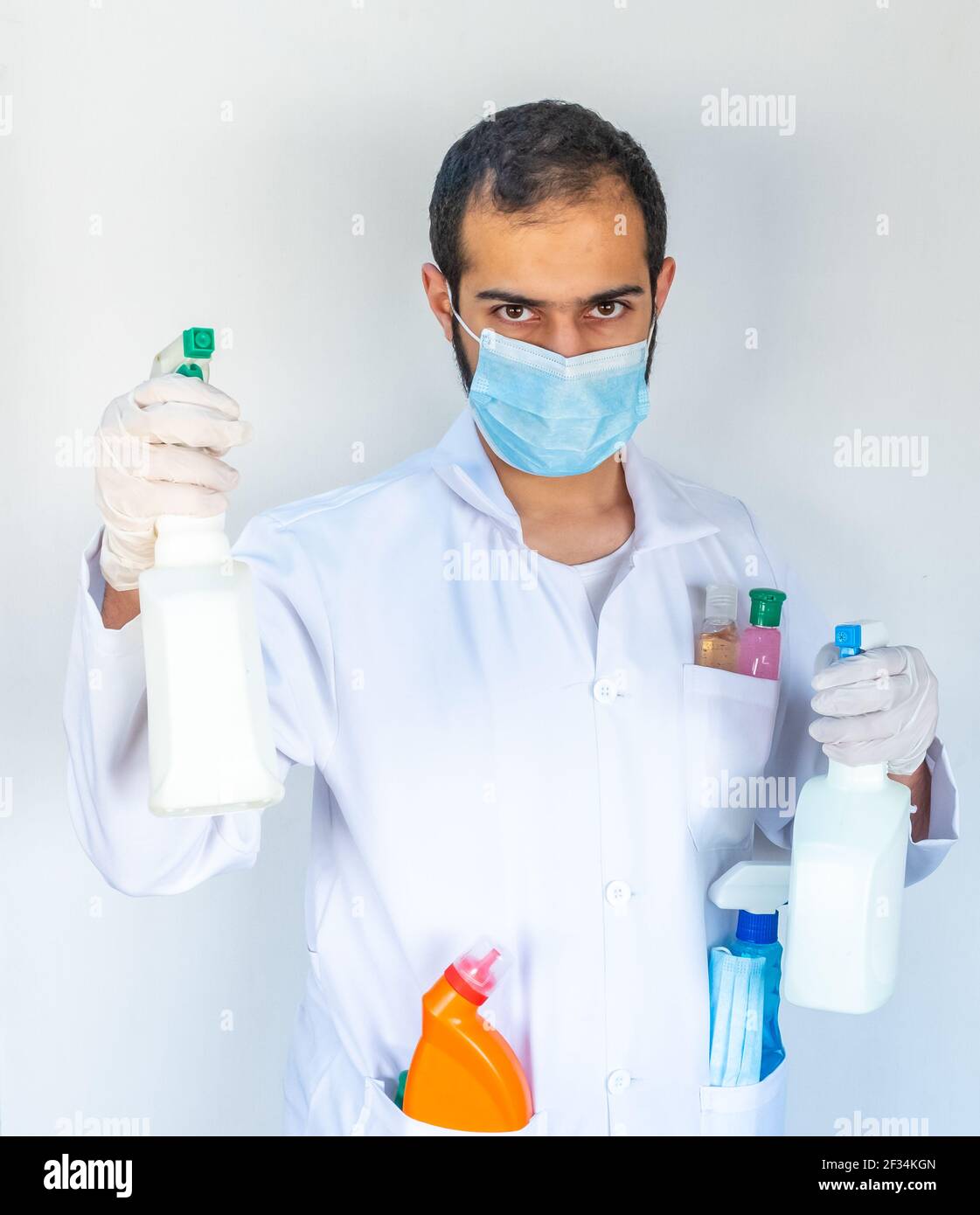 Arabic Muslim, a doctor holding many hygiene products Stock Photo - Alamy