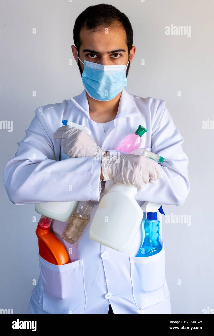 Arabic Muslim, a doctor holding many hygiene products Stock Photo - Alamy