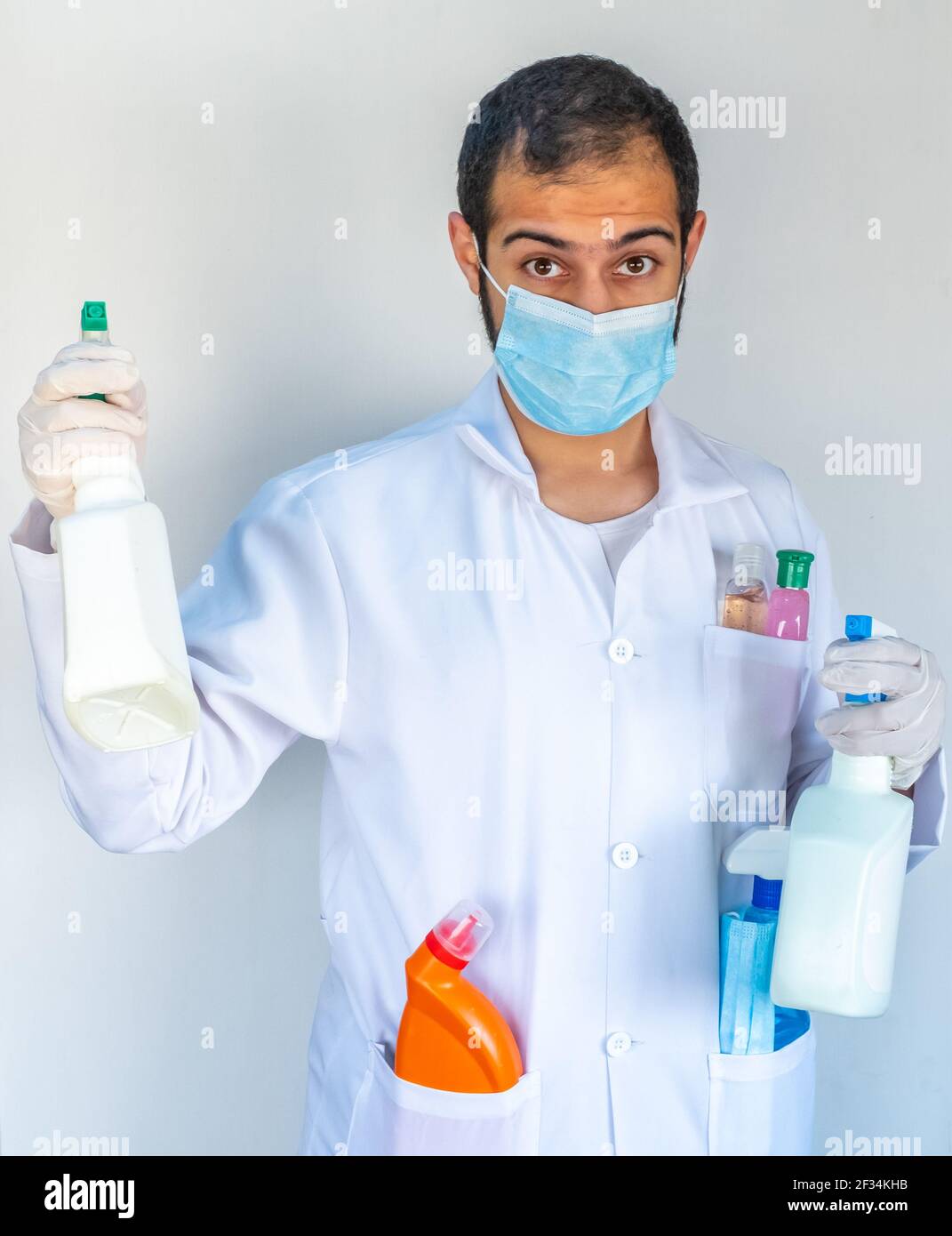 Arabic Muslim, a doctor holding many hygiene products Stock Photo - Alamy
