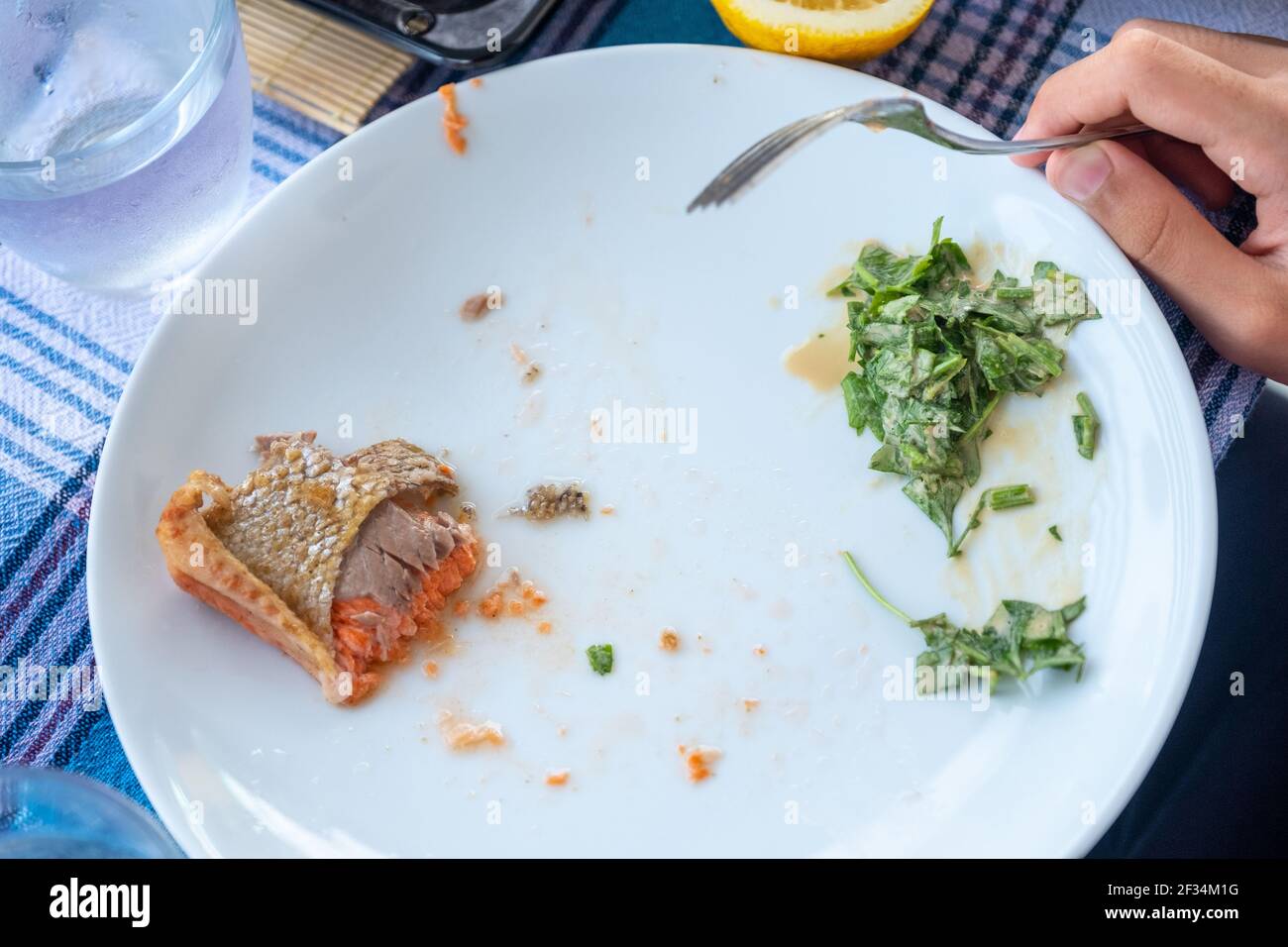 Family gathering to eat fish together Stock Photo - Alamy