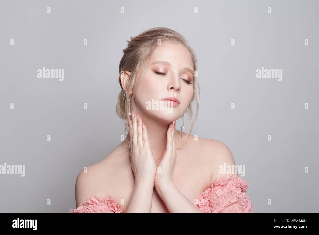 Beautiful female face on white background, portrait Stock Photo - Alamy