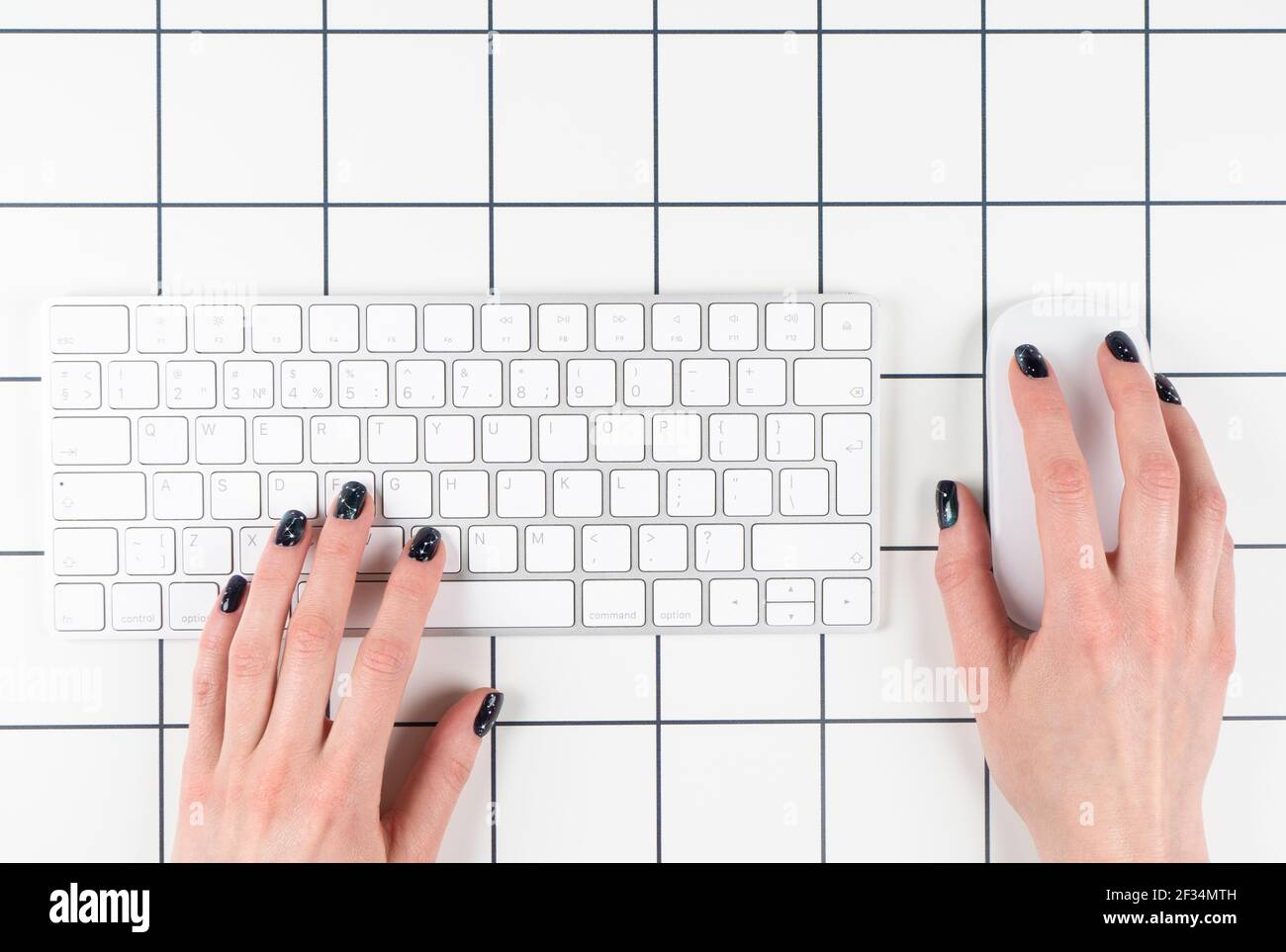 Top view female hand using computer keyboard. Hand typing on desktop ...