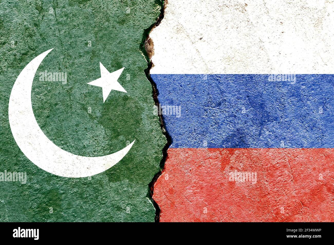 An overlay of the Pakistani and Russian flags on a weathered cracked ...
