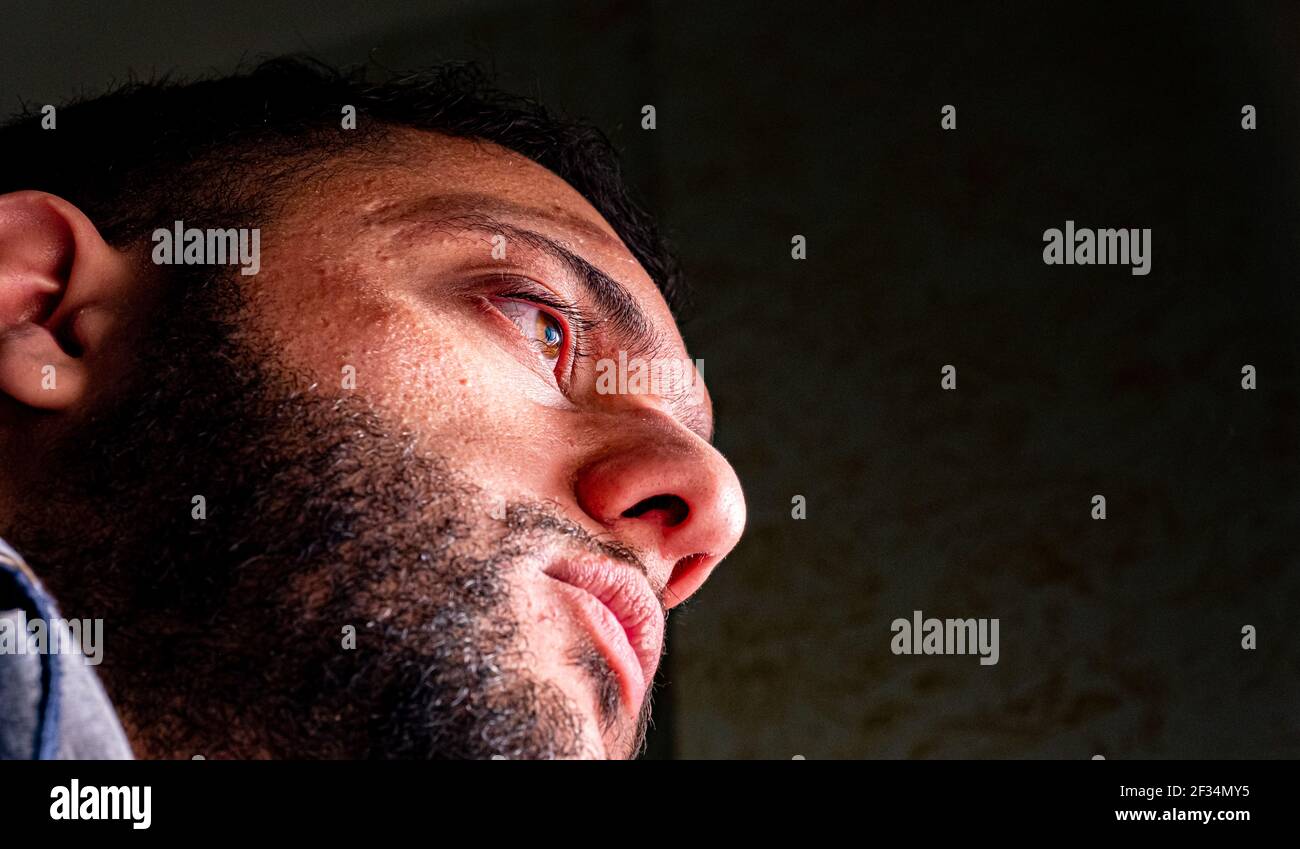 Arabic Muslim man head leaning on the window Stock Photo - Alamy