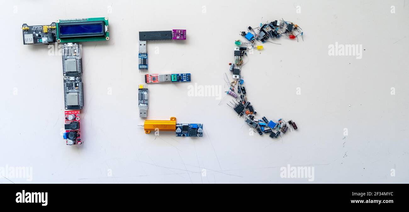Tech word written by electronic parts Stock Photo - Alamy