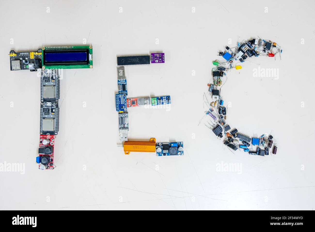 Tech word written by electronic parts Stock Photo - Alamy
