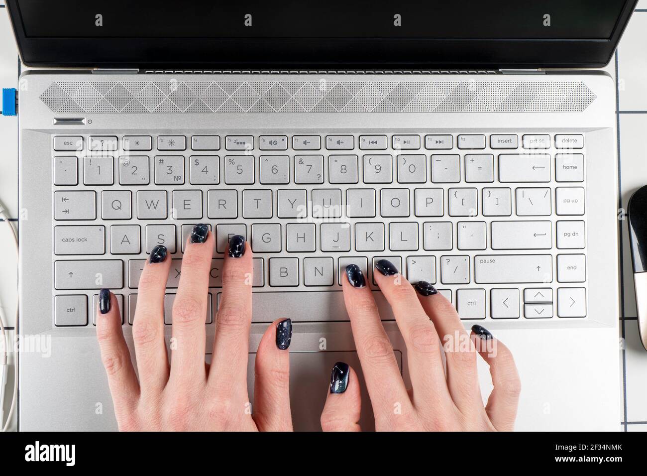 Top view female hand using computer keyboard. Hand typing on desktop ...