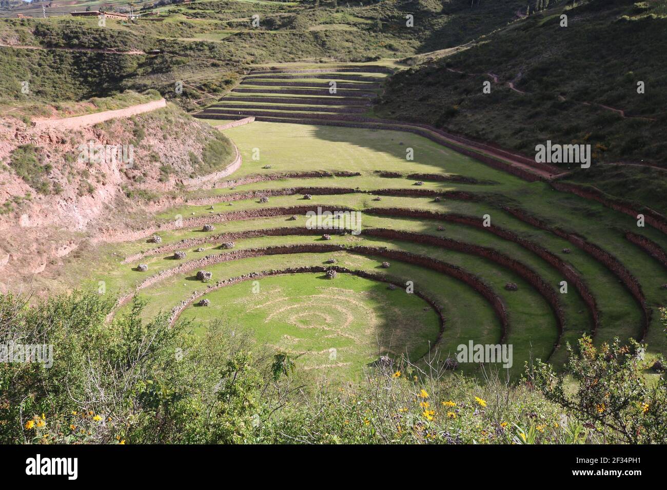 The aerial photo of the large natural amphitheater in-between the hills ...
